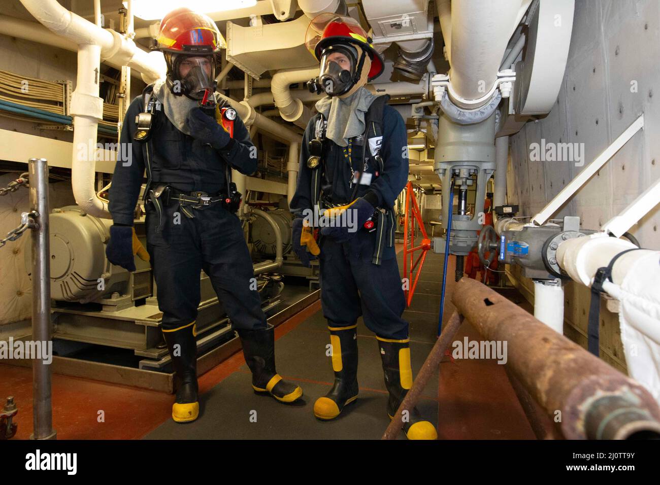 Machinist Mate (Nuclear) 1st Class David Gomez, left, from Tornillo ...