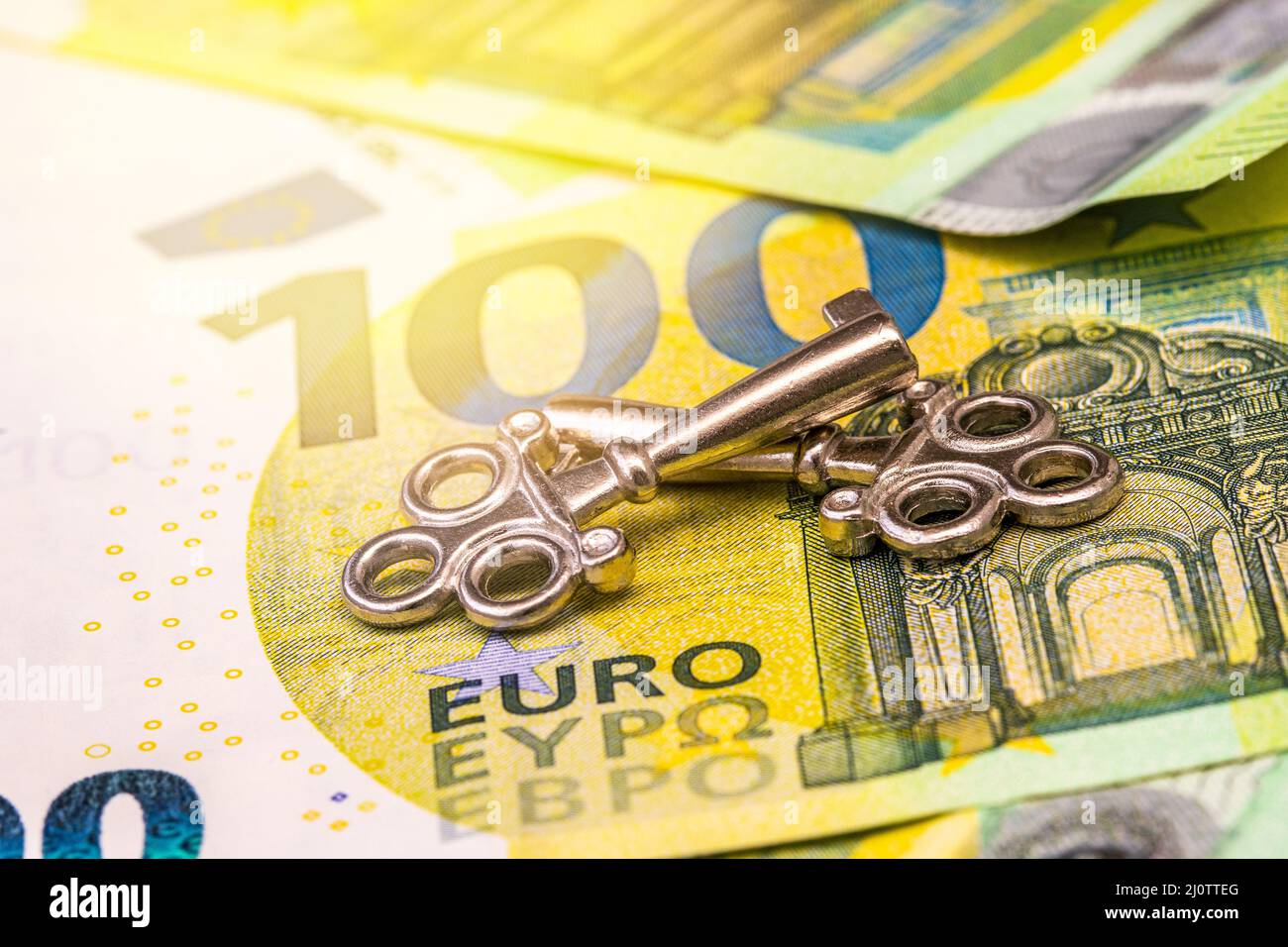 Money and keys Stock Photo - Alamy