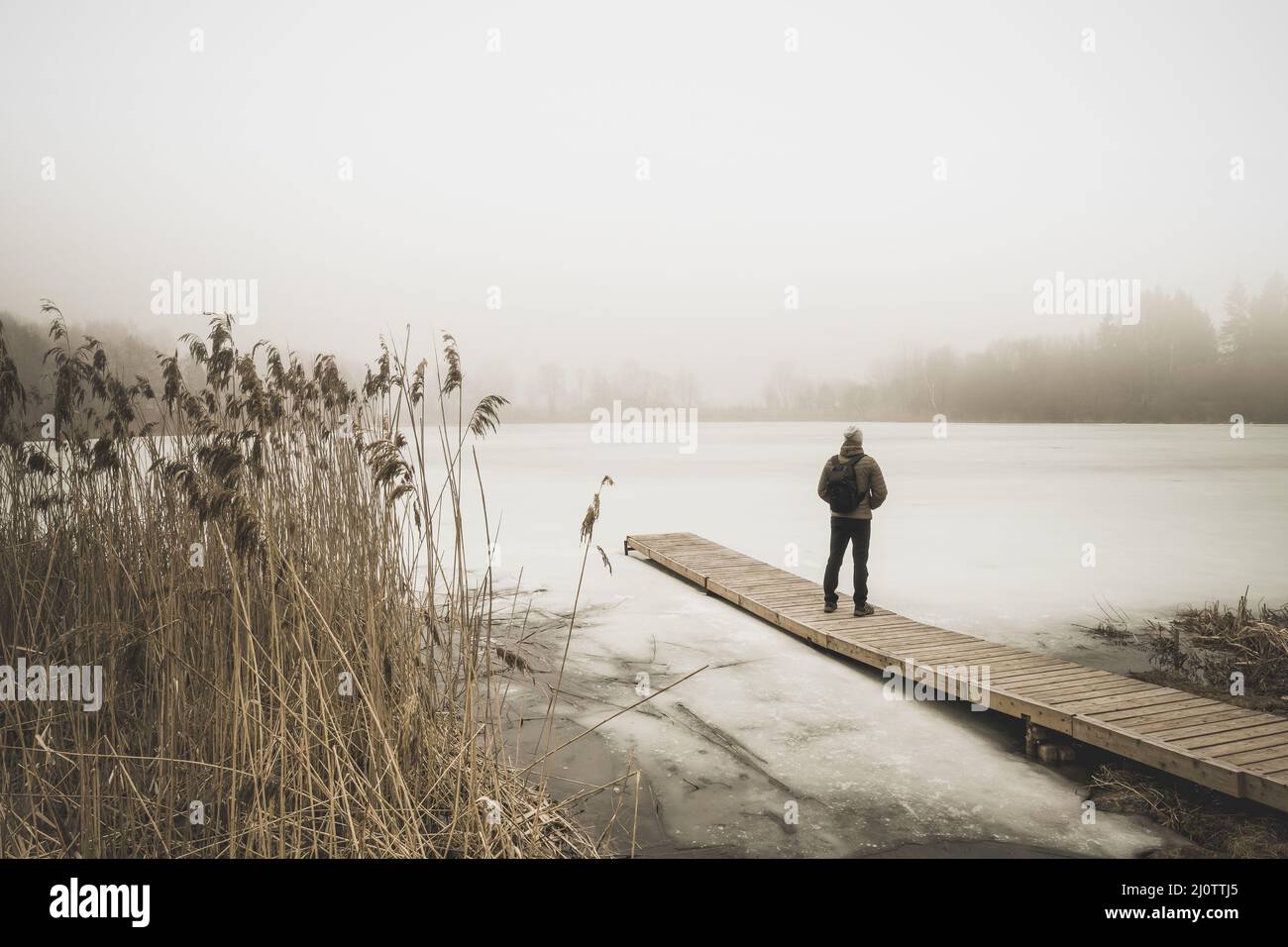 Man standing alone in fog hi-res stock photography and images - Alamy