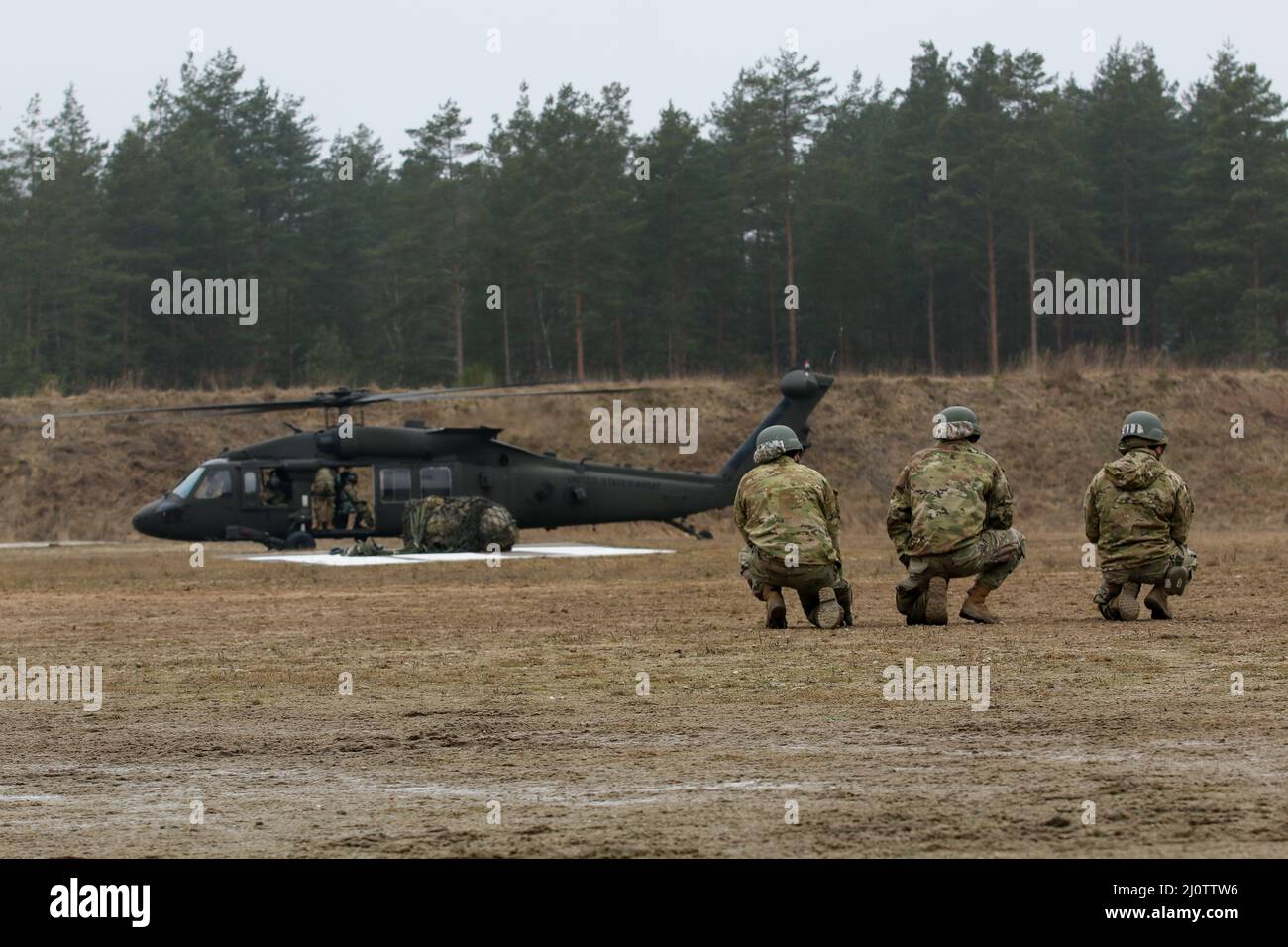 Air assault instructors and students conduct sling-load operations with ...