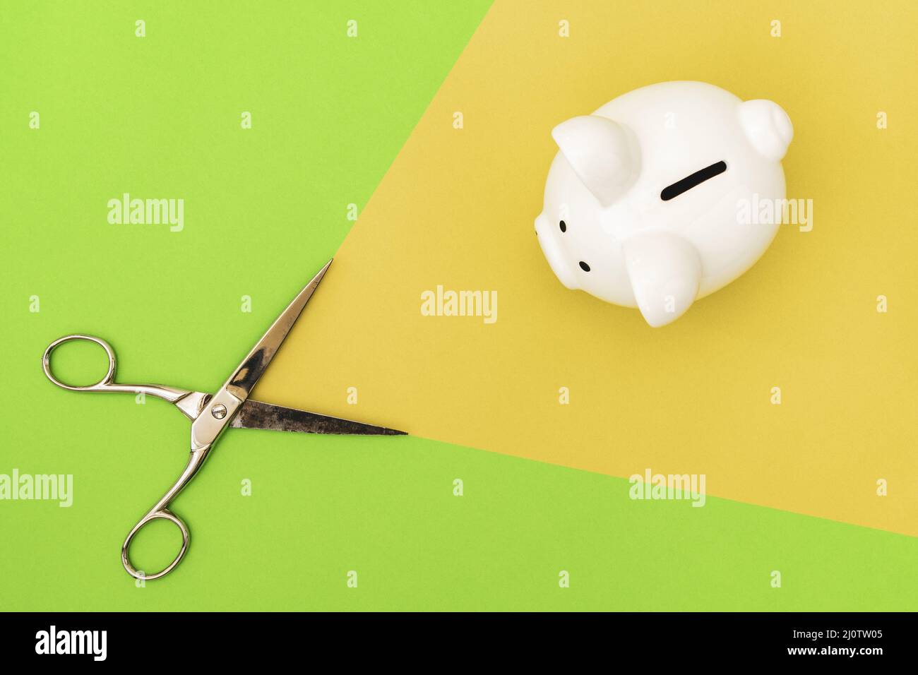 Cut savings concept Stock Photo - Alamy