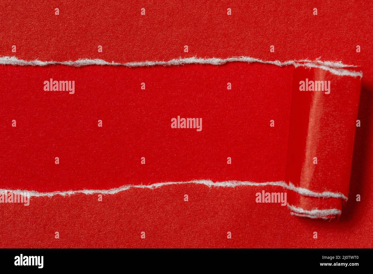 Torn red paper with red background Stock Photo - Alamy