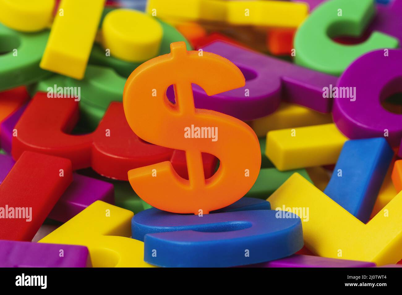 Plastic dollar sign Stock Photo - Alamy