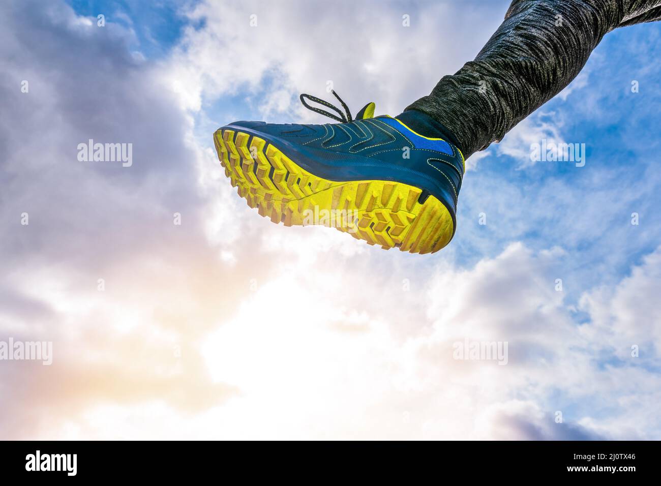 Running and jumping over the camera Stock Photo - Alamy