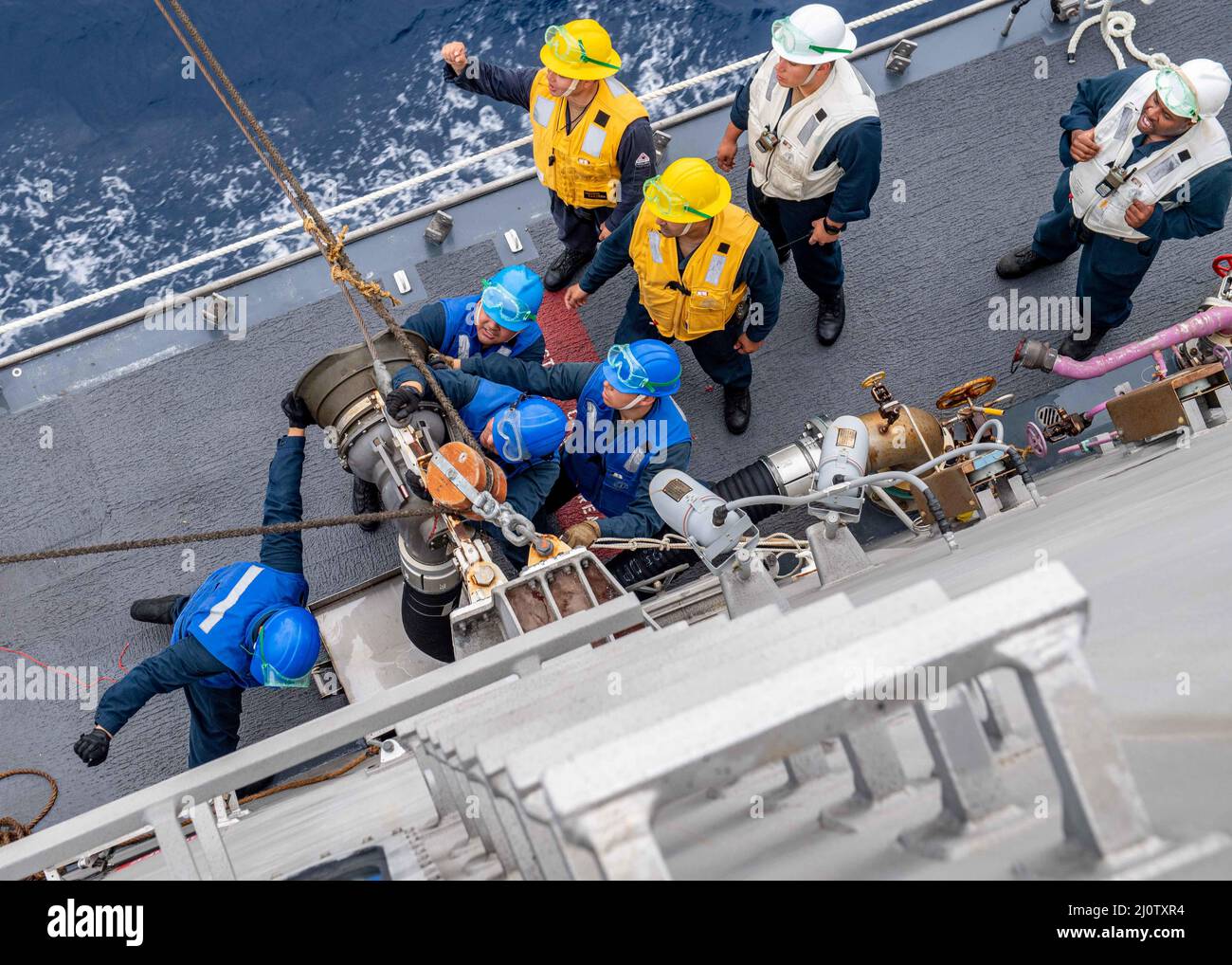 220128-N-PH222-1177 SOUTH CHINA SEA (Jan. 28, 2022) Sailors secure the ...