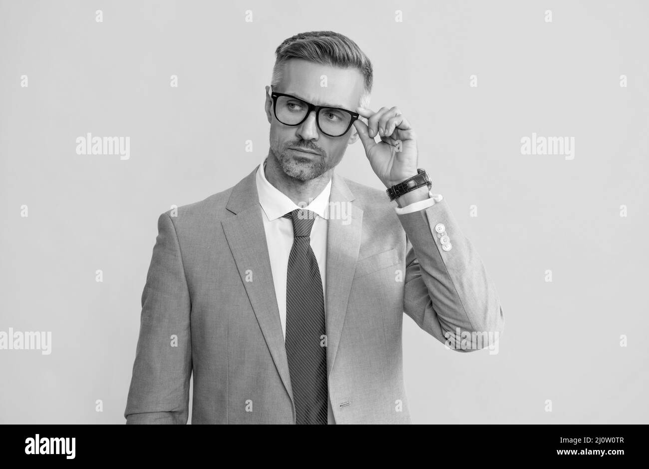 Handsome businessman in suit glasses Black and White Stock Photos ...