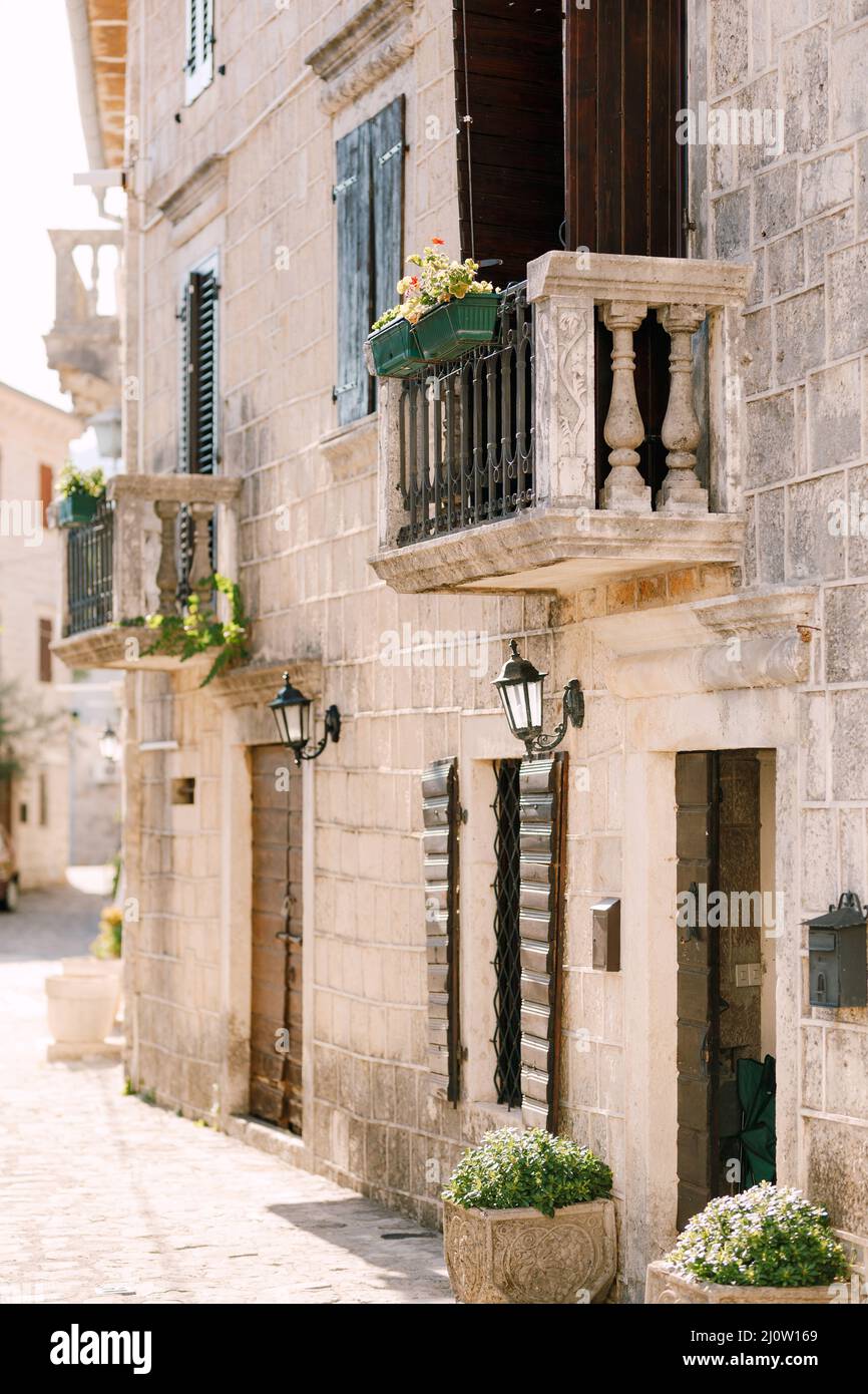 Balcony stone house flowers hi-res stock photography and images - Alamy