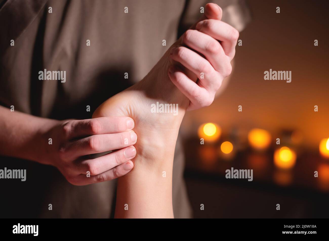 Male foot massage hi-res stock photography and images - Alamy