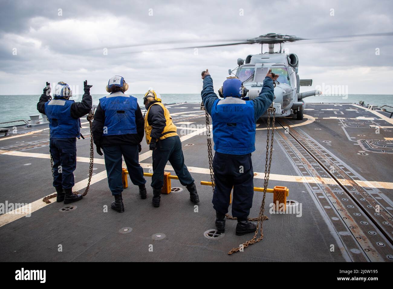 220128-N-TR141-0098 EAST CHINA SEA (Jan. 28, 2022) Sailors assigned to ...