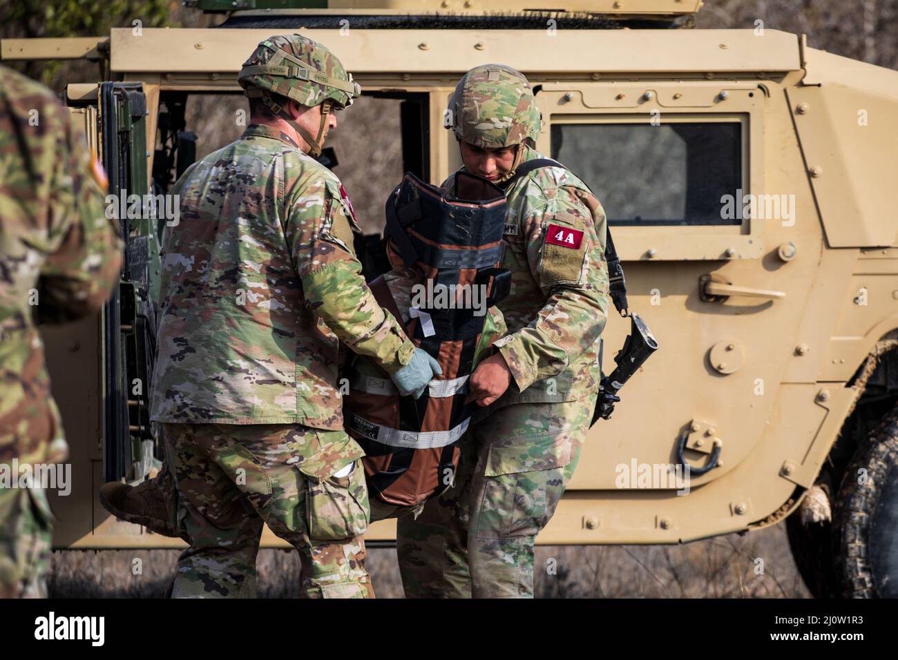 Staff Sgt. Timothy Rebich (left) and Staff Sgt. Alejandro Preciado ...