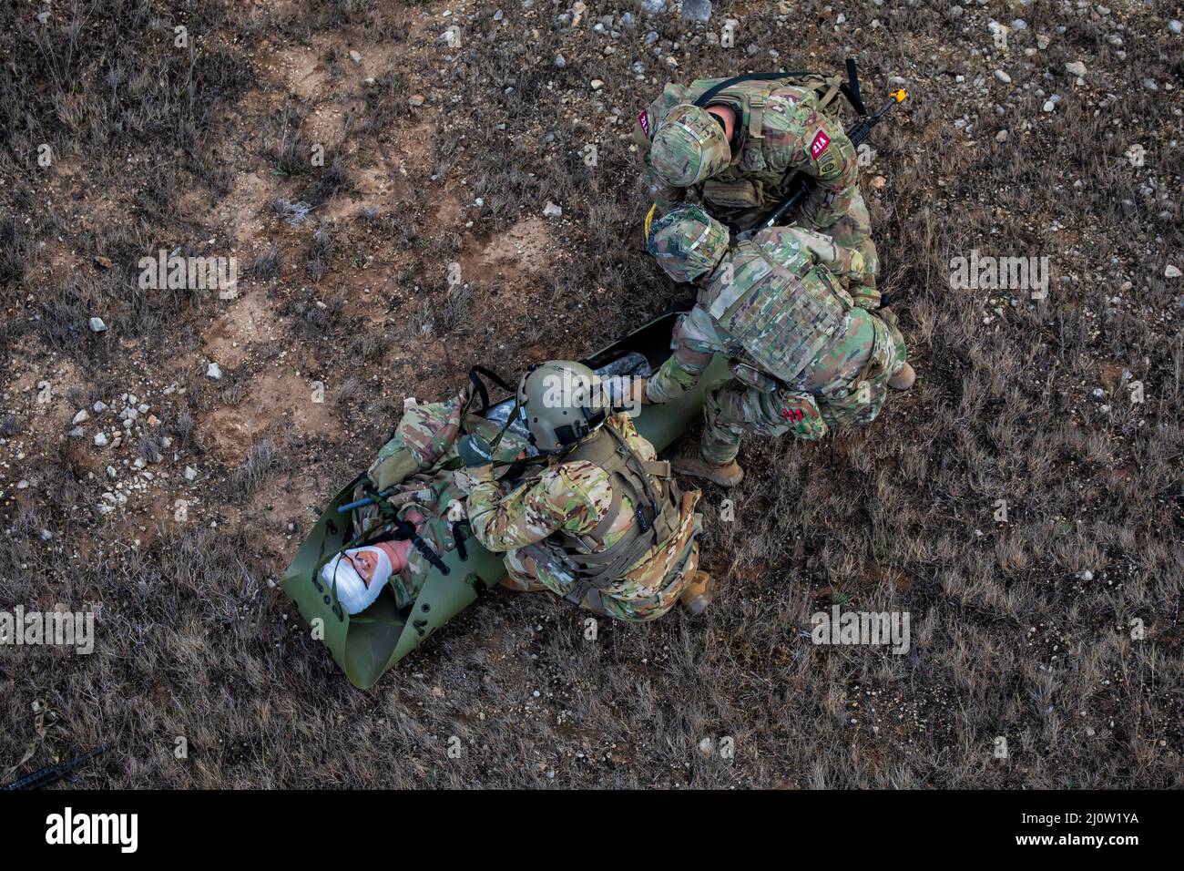 A flight paramedic and two Soldiers competing in the Jack L. Clark Jr ...