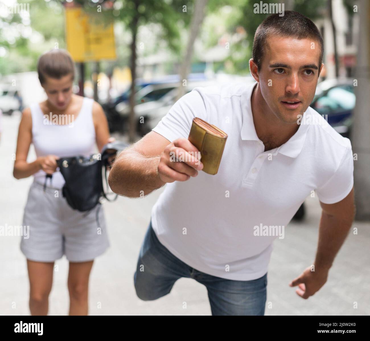 Robber running outside hi-res stock photography and images - Alamy