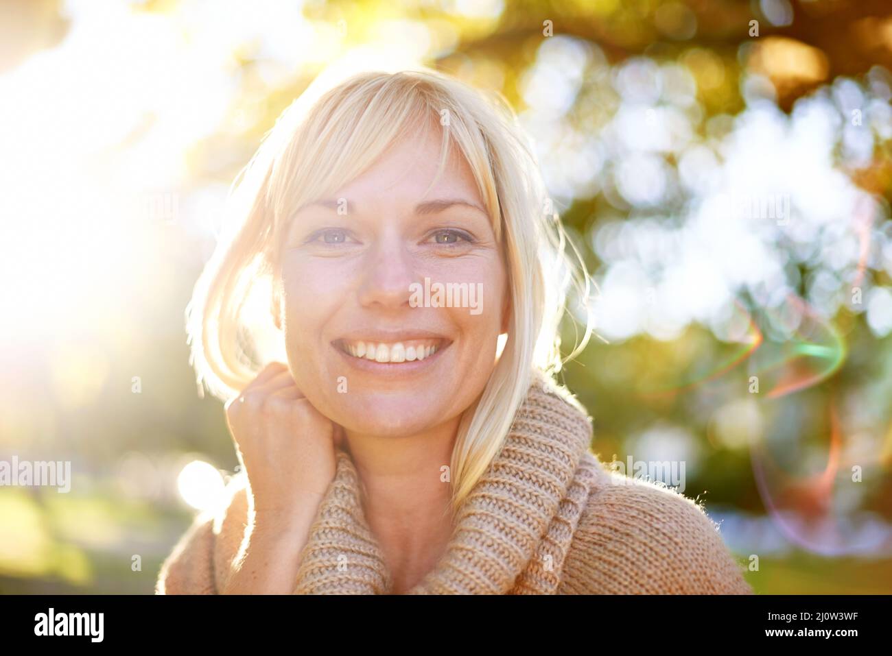 A smile as bright as the day. A portrait of a beautiful woman in the ...