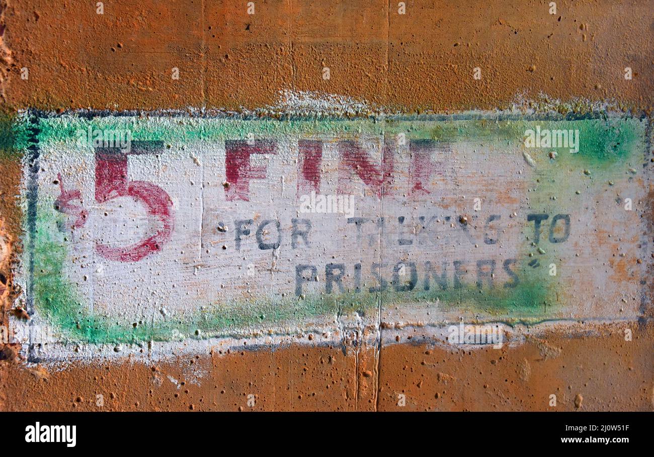 Five cents is charged to anyone talking to prisoners. This sign is ...