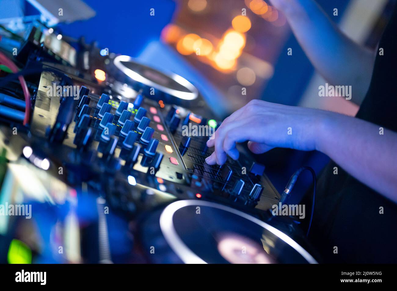 Dj mixing at party festival with light and smoke in background - Summer ...