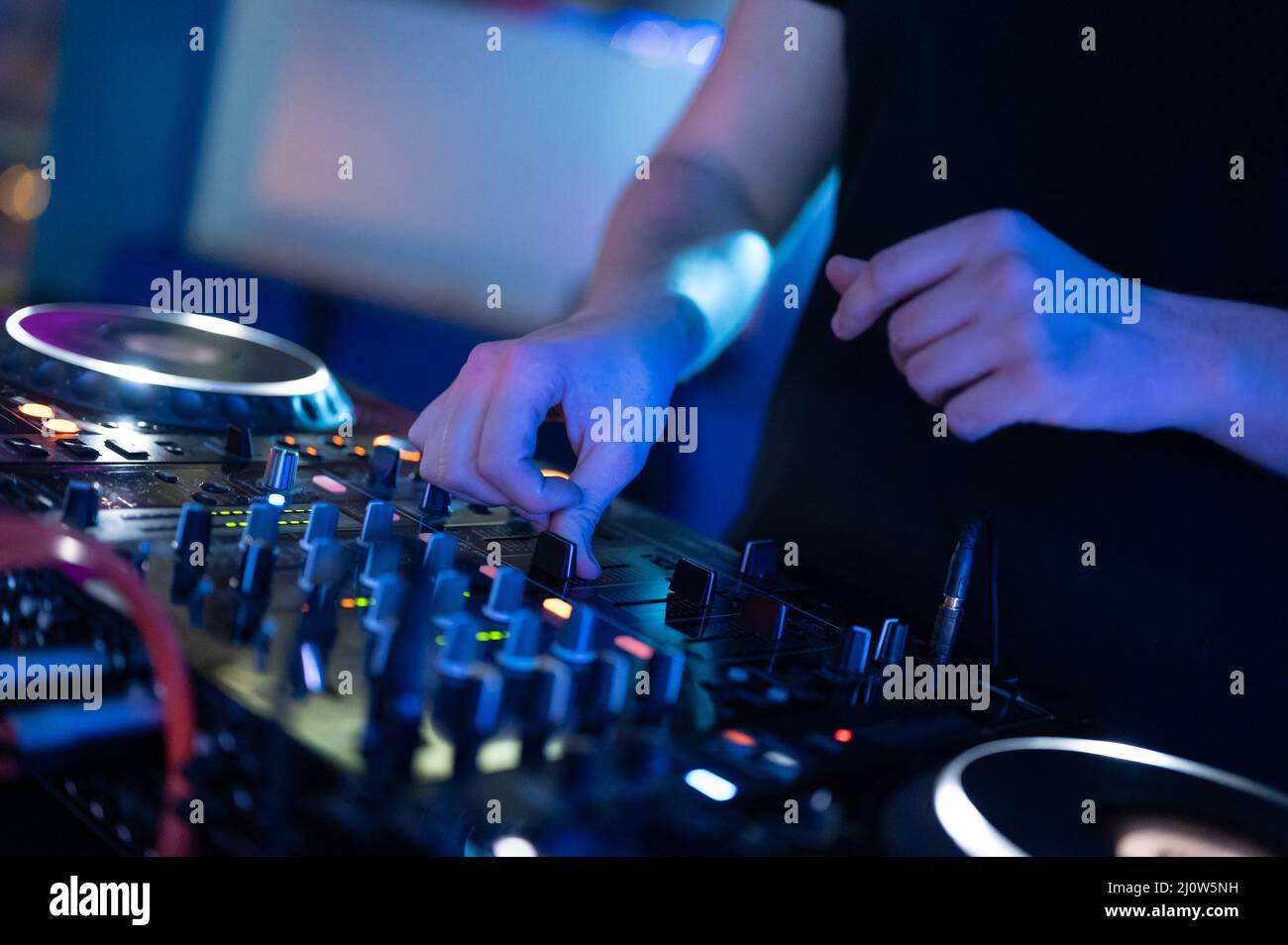 Dj mixing at party festival with light and smoke in background - Summer ...