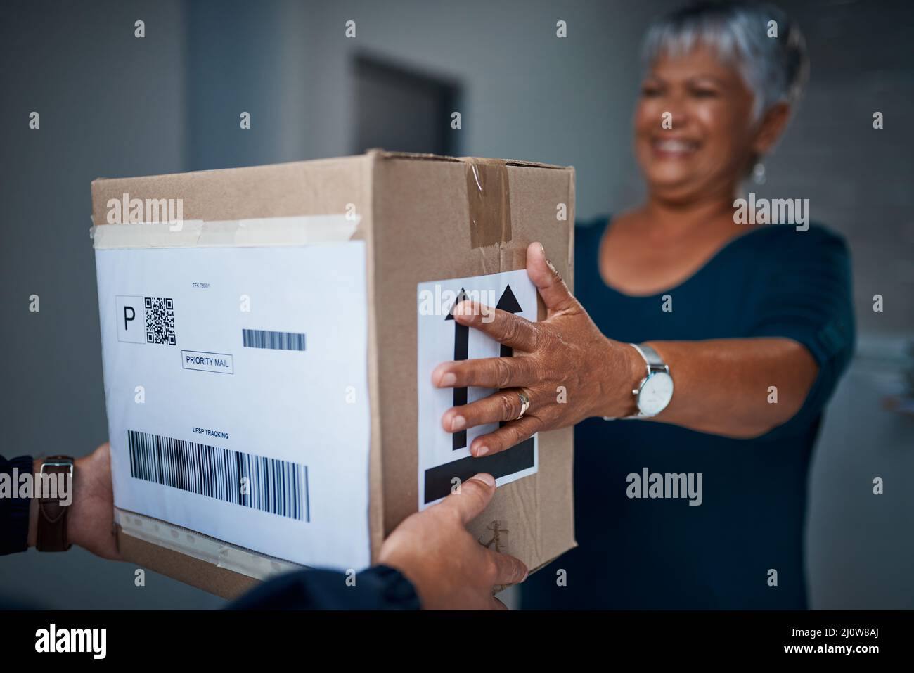 Another package delivered on time, how great. Cropped shot of a package ...