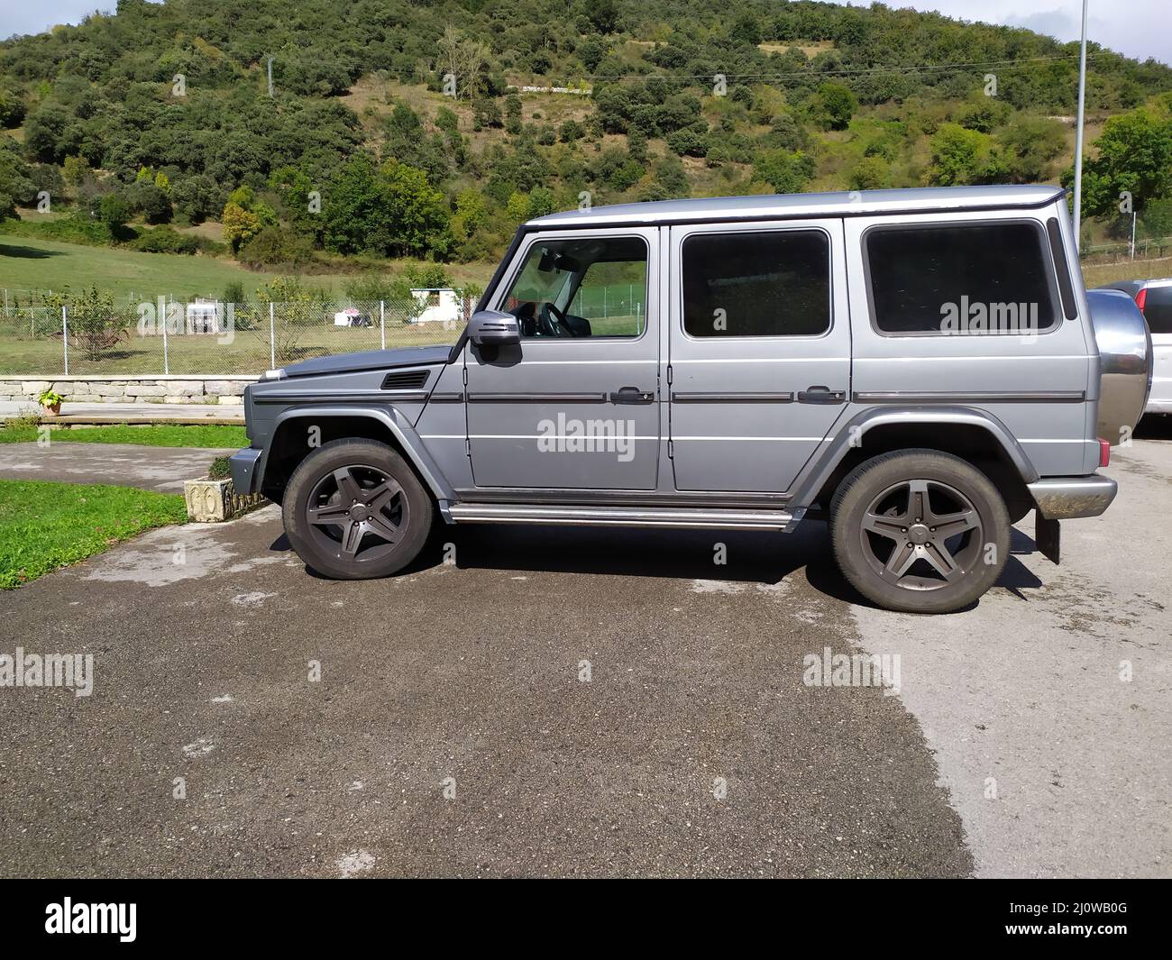 Luxury off-road car parked on the street Stock Photo - Alamy