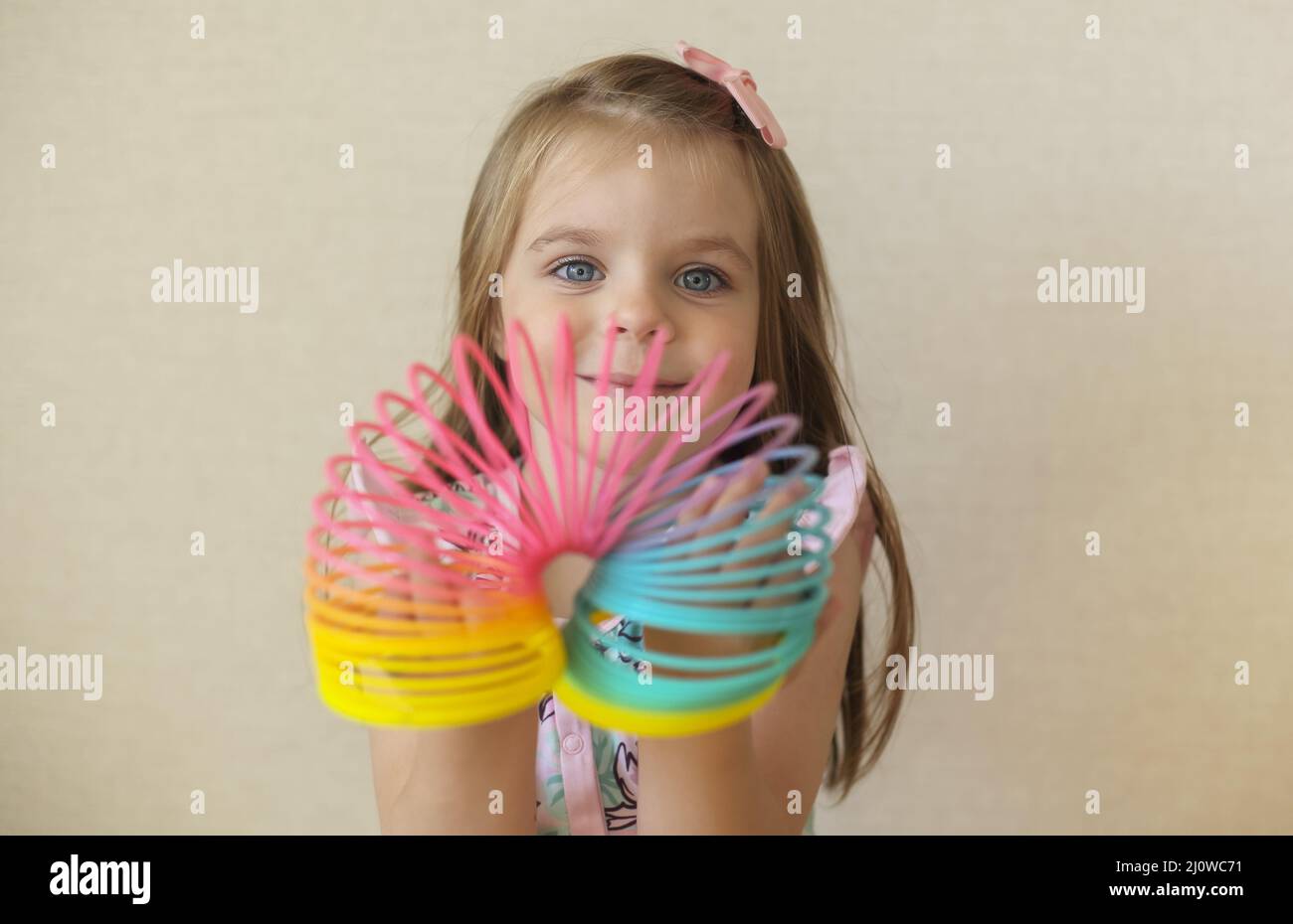 Slinky toy hand hi-res stock photography and images - Alamy
