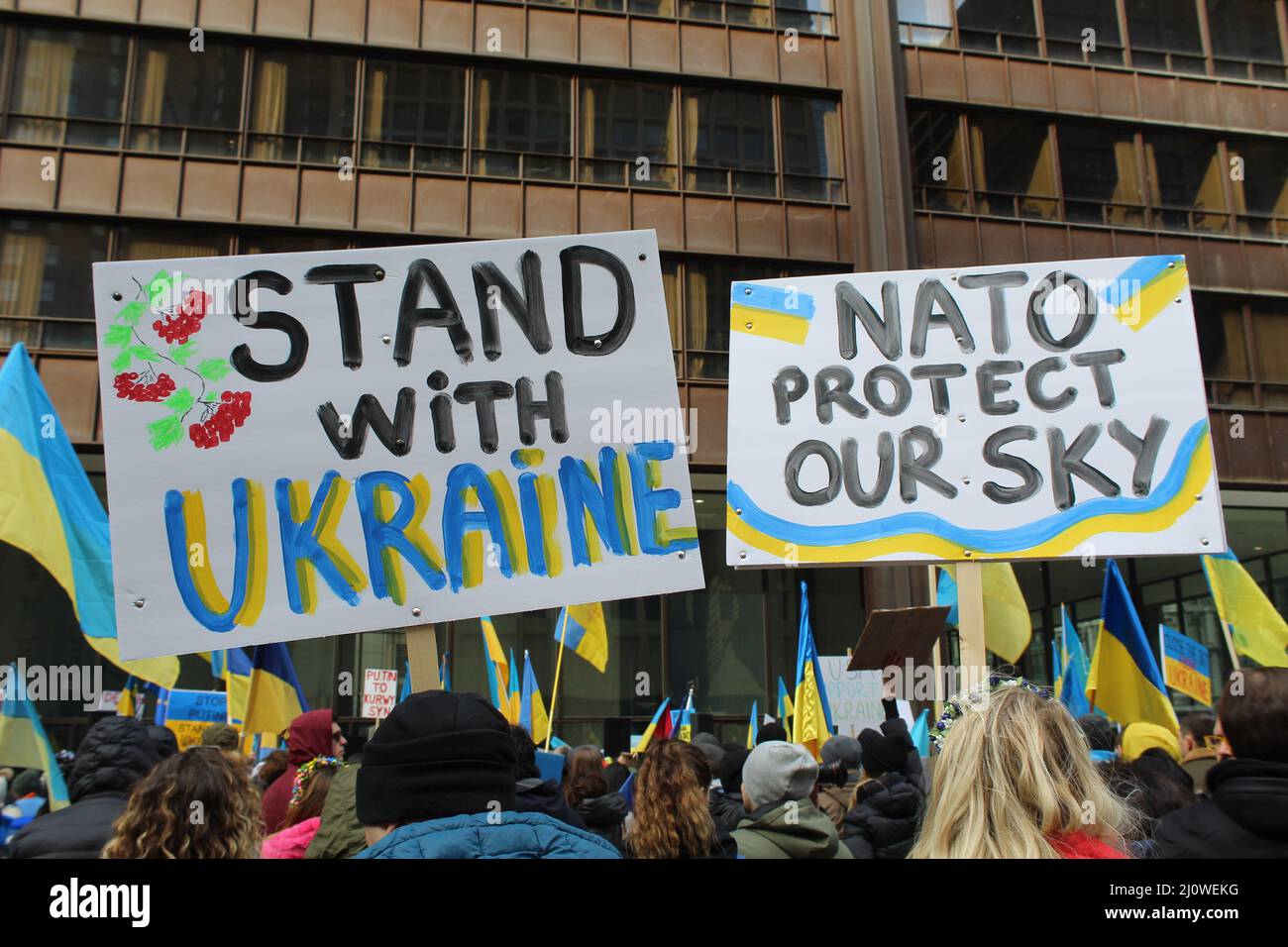 Stand With Ukraine and NATO Protect Our Sky pro-Ukraine protest signs ...