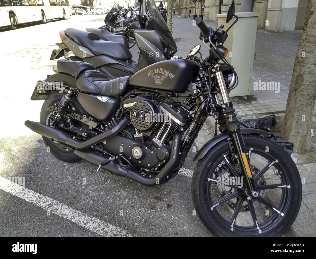 Classic black custom chopper motorbike parked in the street Stock Photo ...
