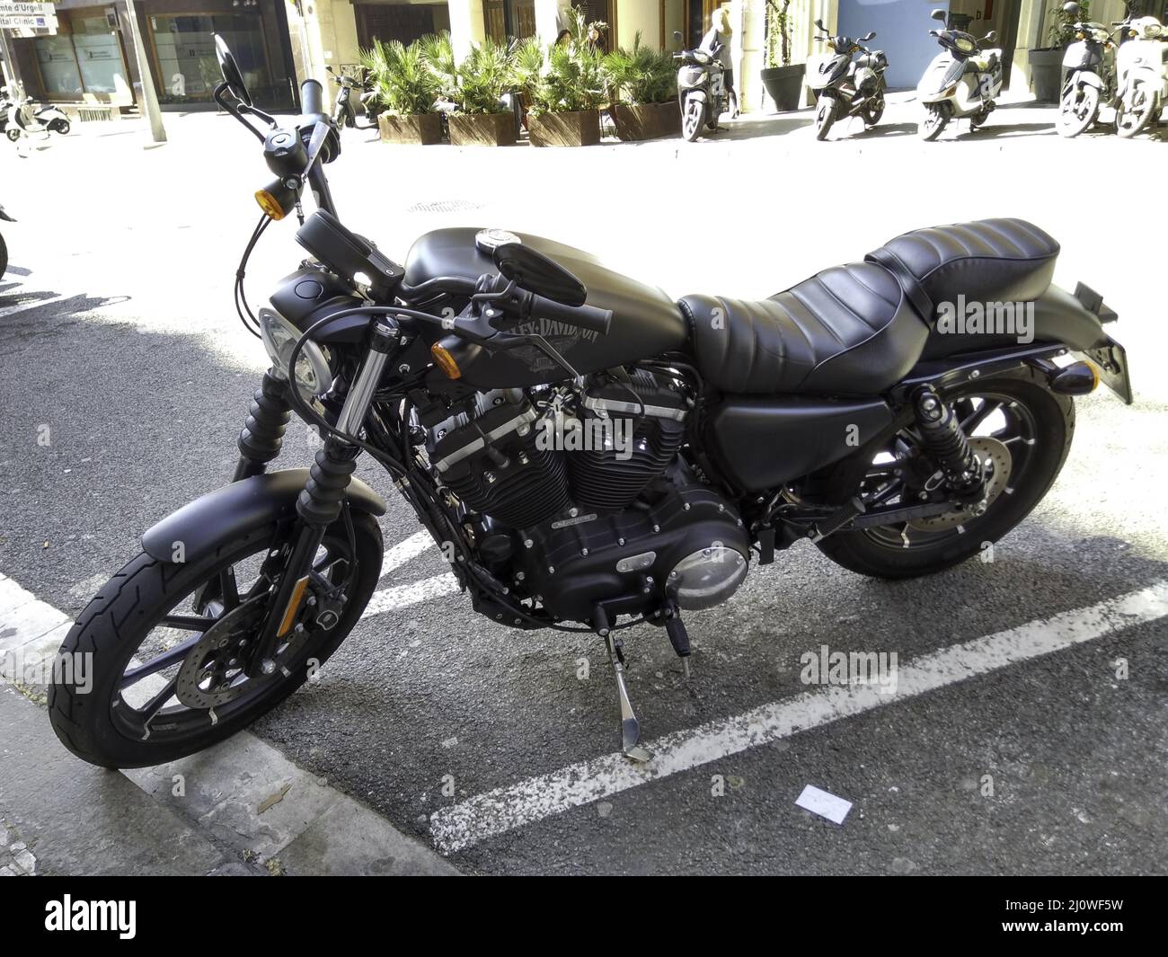 Classic black custom chopper motorbike parked in the street Stock Photo ...