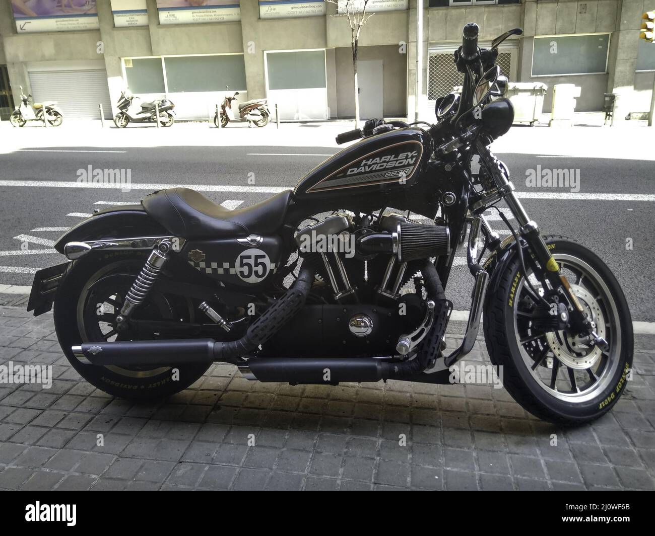 Classic black custom chopper motorbike parked in the street Stock Photo ...