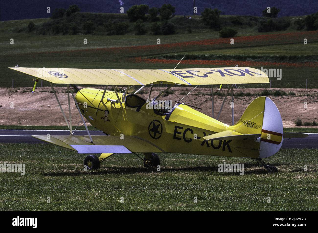 Classic yellow biplane in the aeroclub Stock Photo - Alamy
