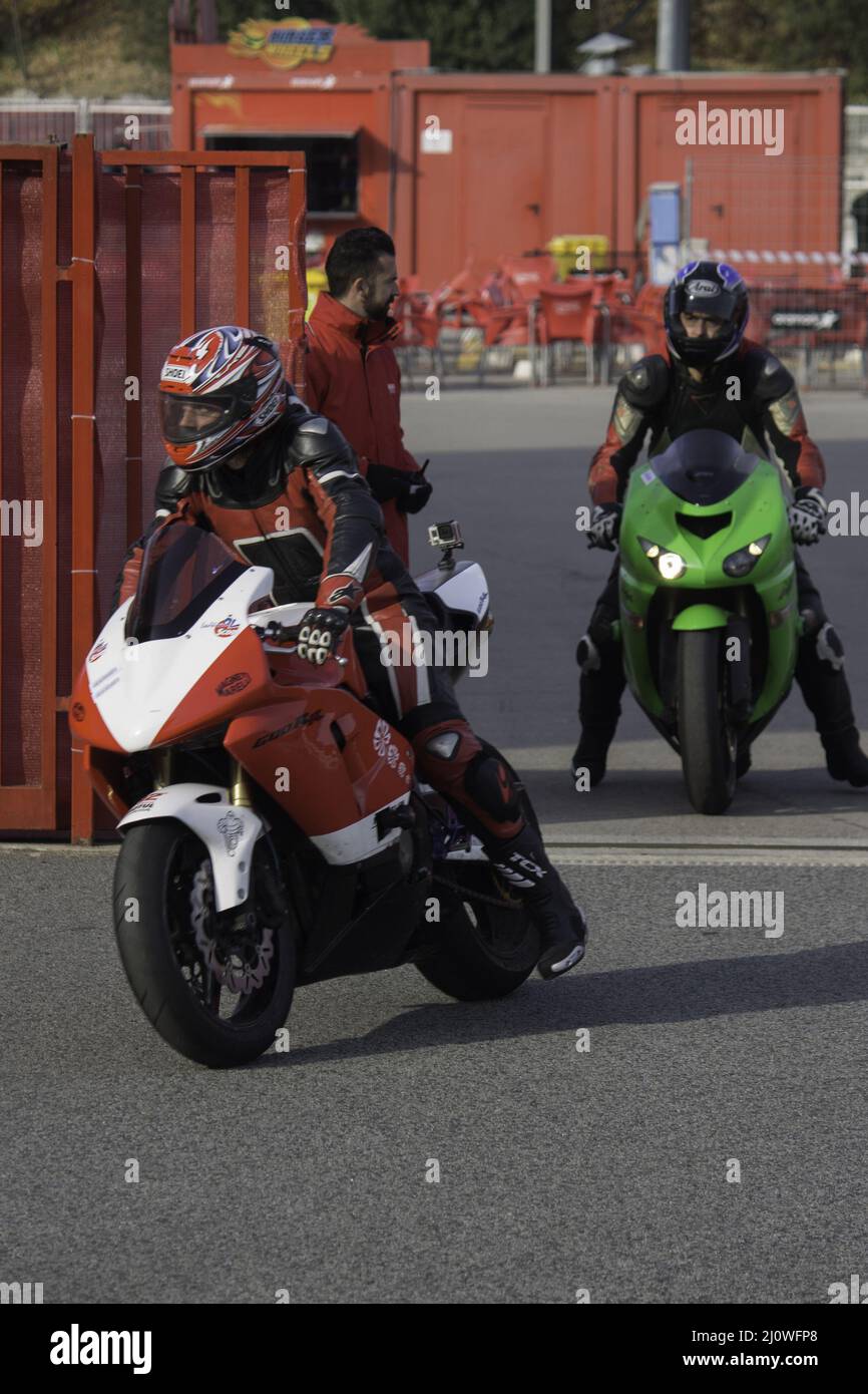 Classic racing sport motorbike running in the asphalt track Stock Photo ...