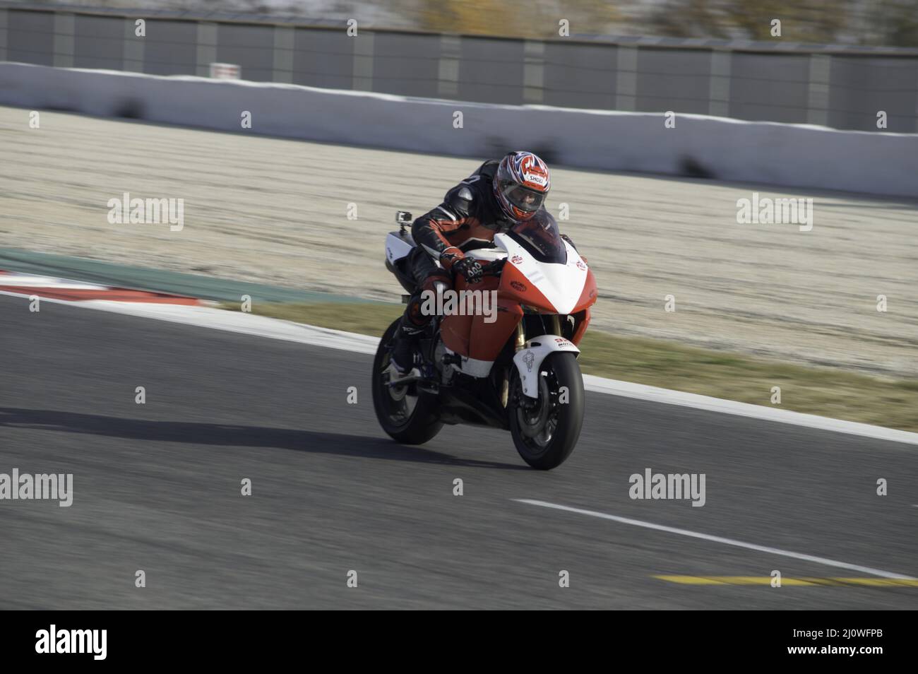Classic racing sport motorbike running in the asphalt track Stock Photo ...