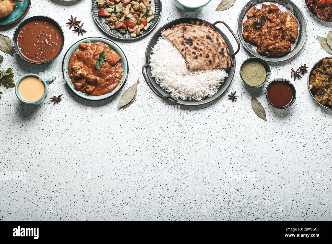 Indian ethnic food buffet on white concrete table top view copy space ...