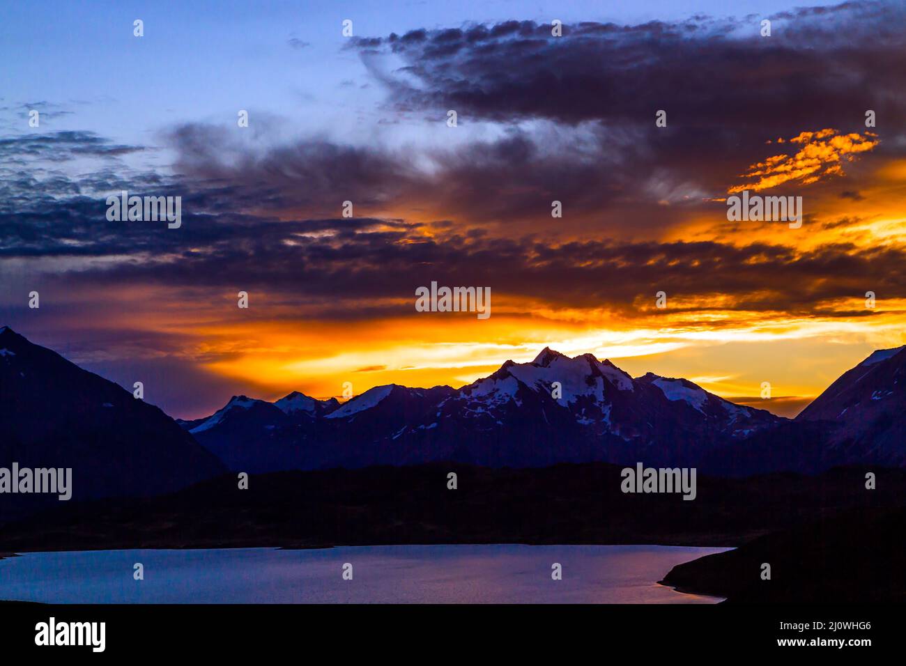 Orange sunset in Patagonia Stock Photo - Alamy