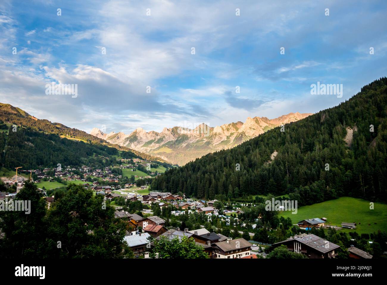 Sunset on The Grand-Bornand village and the Aravis mountain range Stock ...