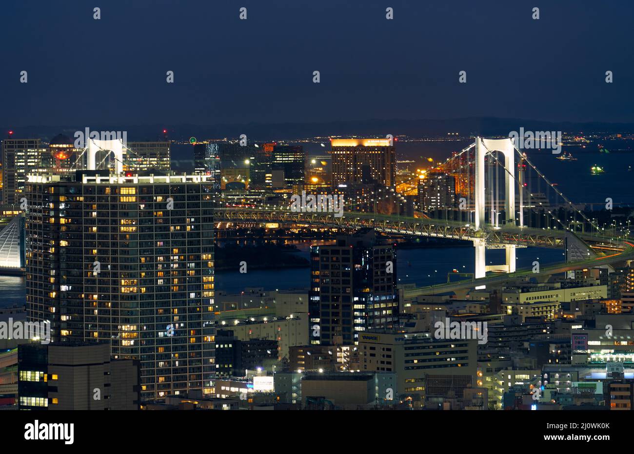 Tokyo night scene. The Rainbow Bridge over Tokyo bay at night. Minato ...
