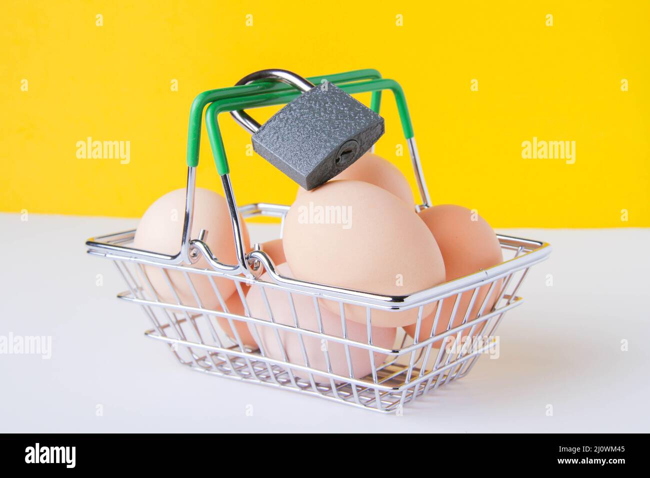 Ban on the sale of chicken eggs. Food sanctions. Basket with groceries ...