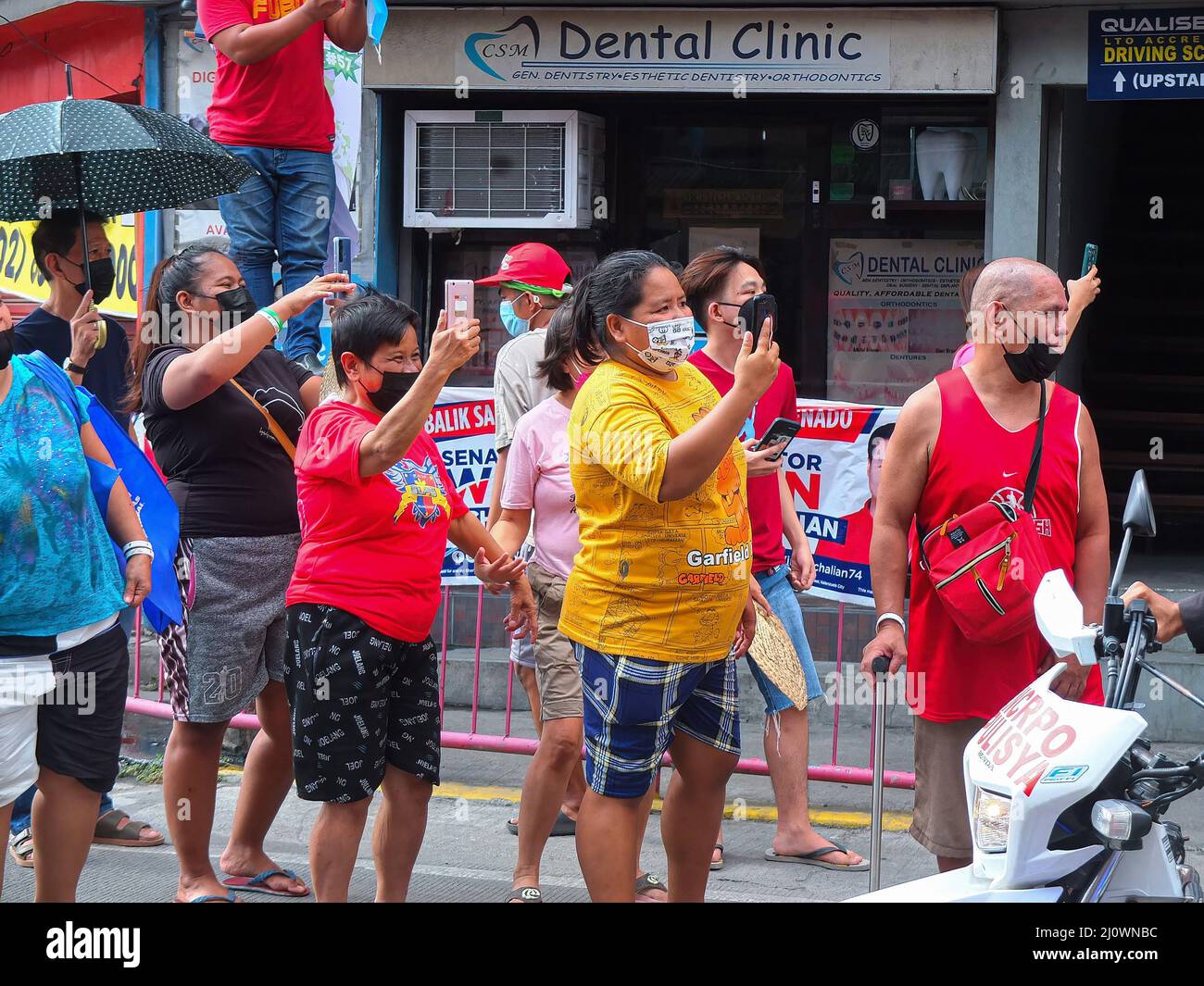 Bongbong Marcos supporters taking out their smartphones to take photos ...