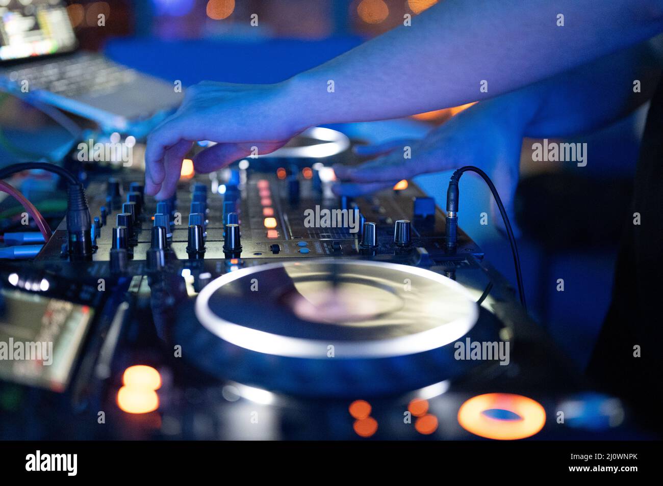 Dj mixing at party festival with light and smoke in background - Summer ...