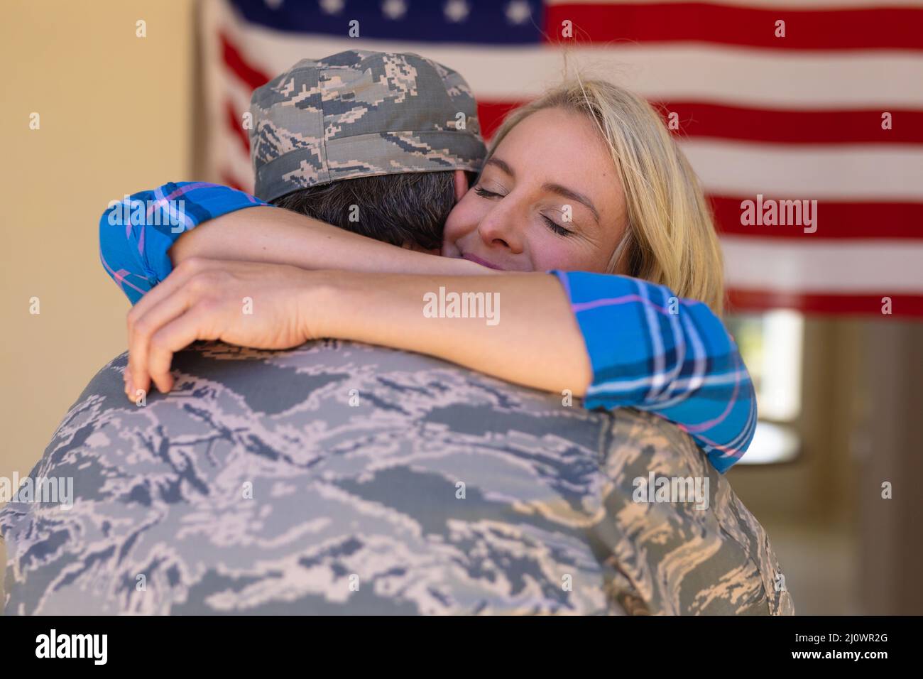 American flag waving against caucasian hi-res stock photography and ...