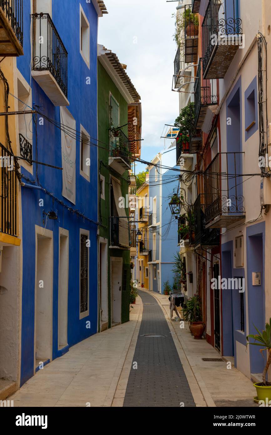 Narrow street with many colorful houses in the center of the historic ...
