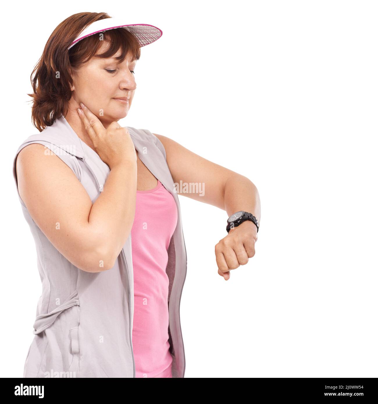 Making sure her heartbeat feels healthy. Mature woman taking her pulse ...