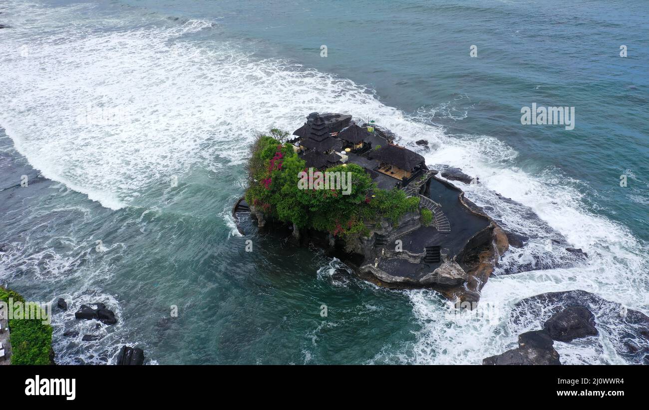 Aerial drone view of the stunning Tanah Lot Balinese Hindu temple and ...