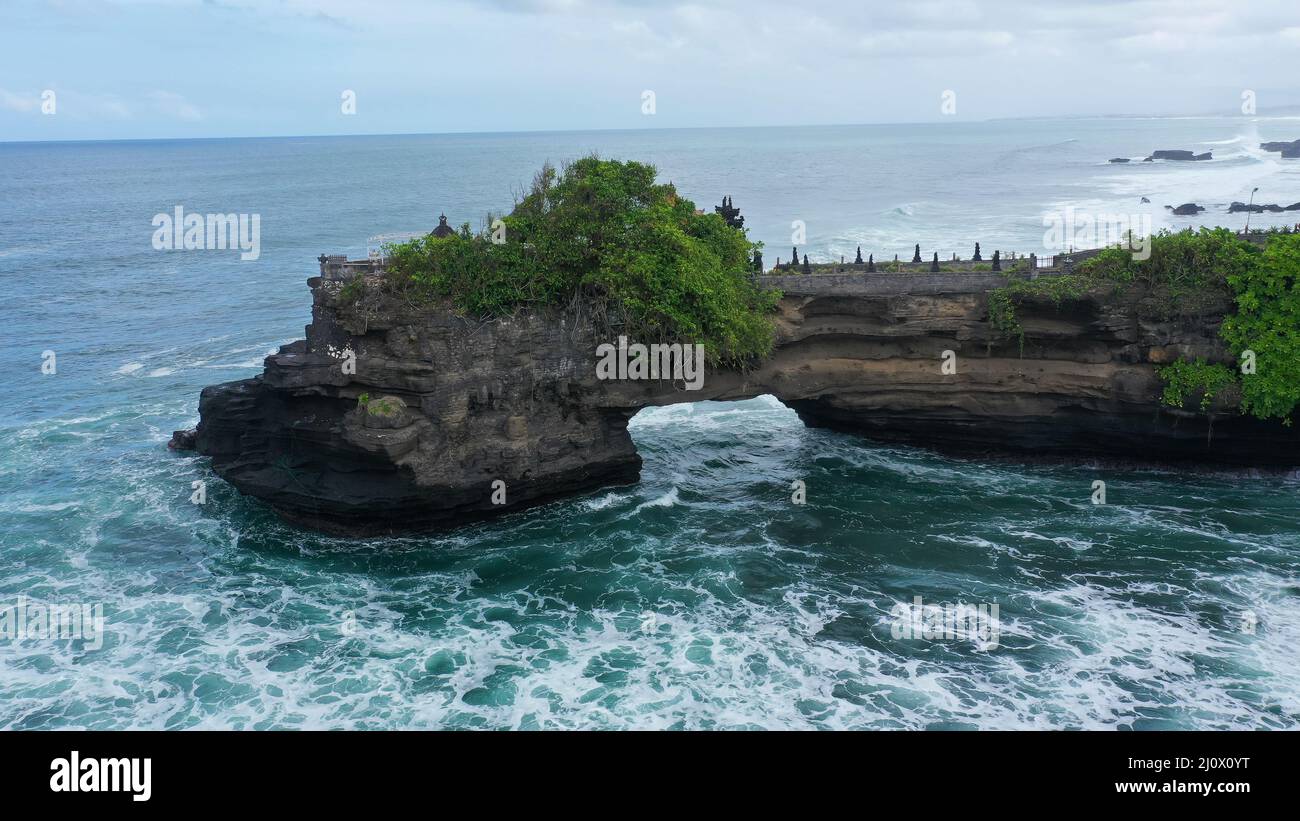 Pura Batu Bolong Temple on rock formation bridge, Tabanan, Bali ...