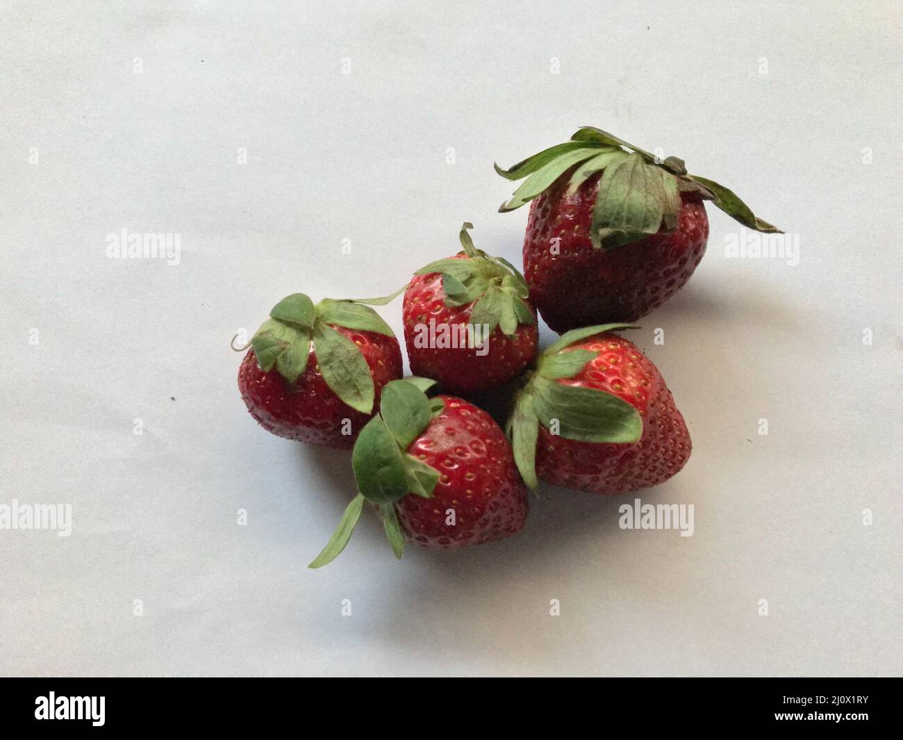 five strawberries isolated on white background . Strawberry isolated ...