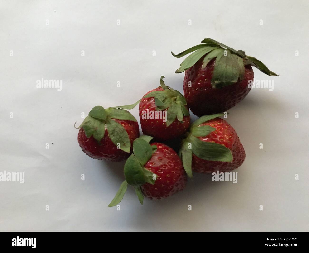 five strawberries isolated on white background . Strawberry isolated ...