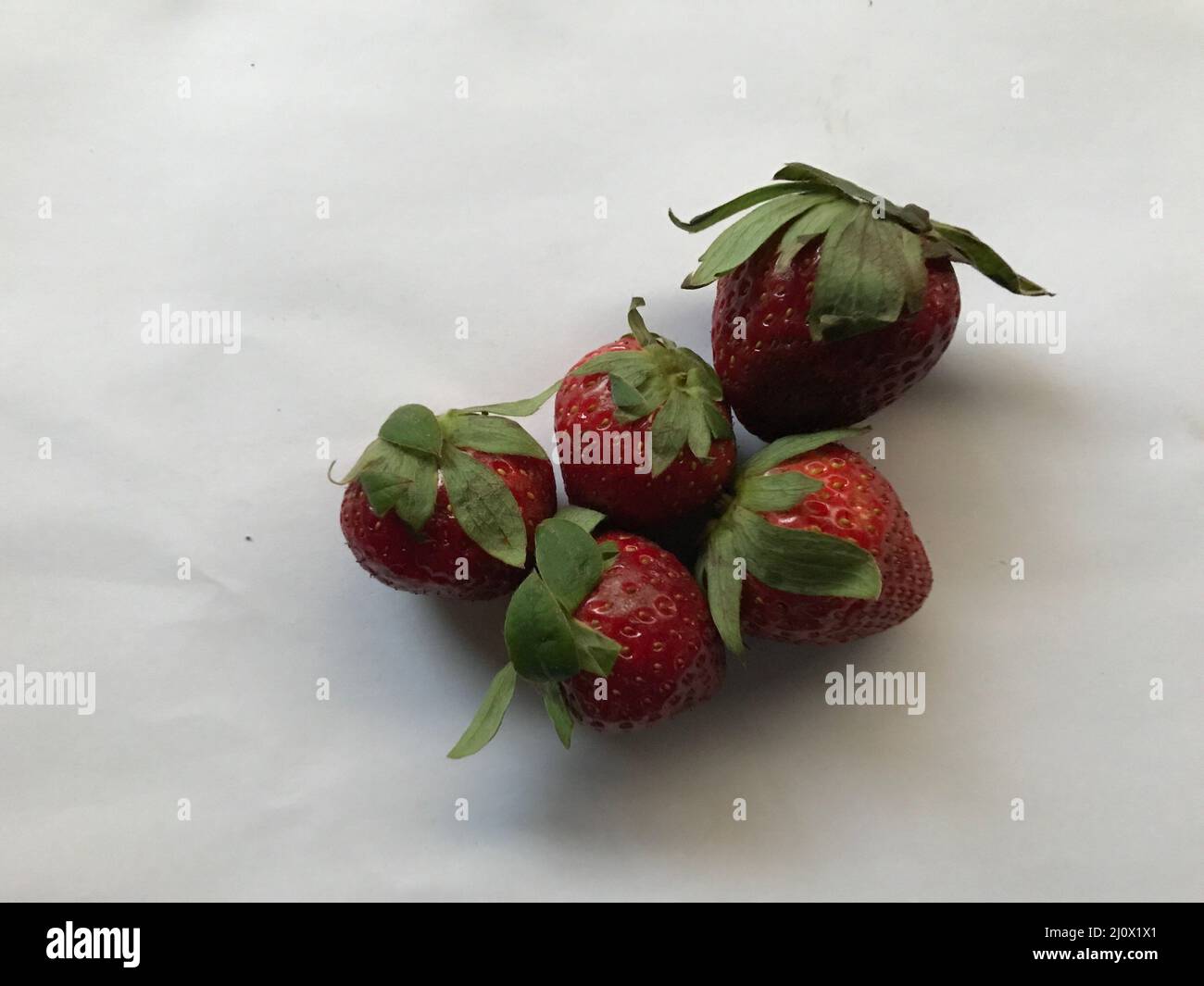 five strawberries isolated on white background . Strawberry isolated ...