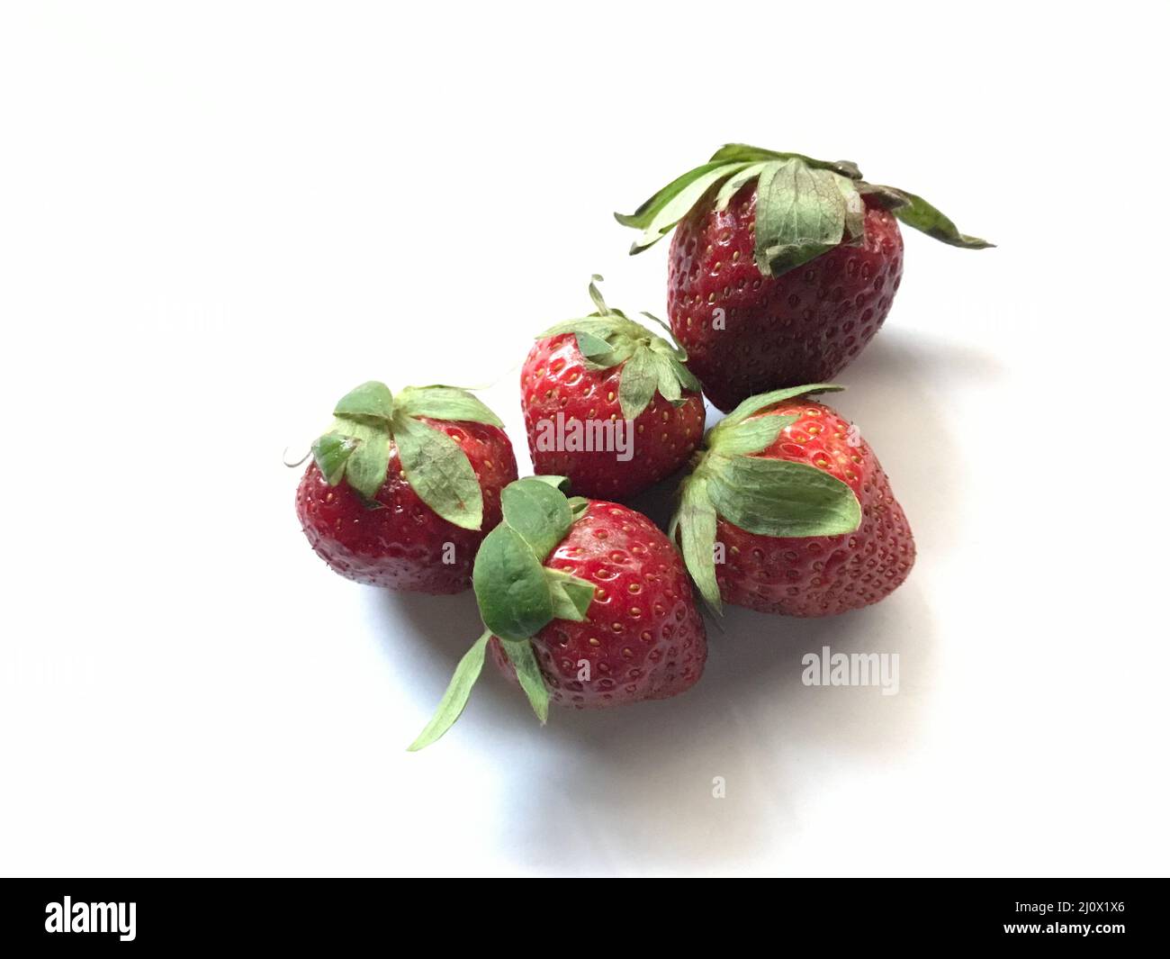 five strawberries isolated on white background . Strawberry isolated ...