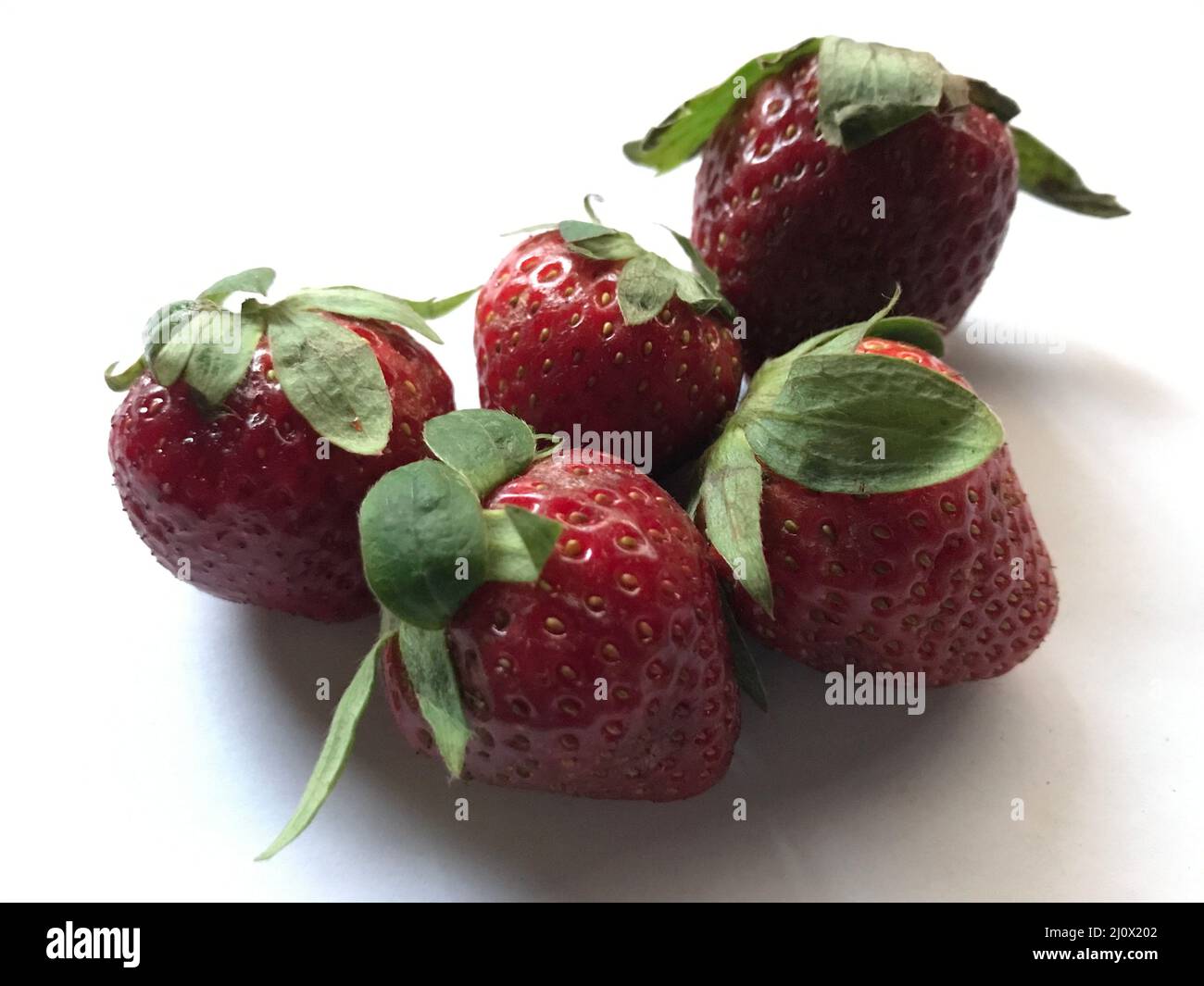 five strawberries isolated on white background . Strawberry isolated ...