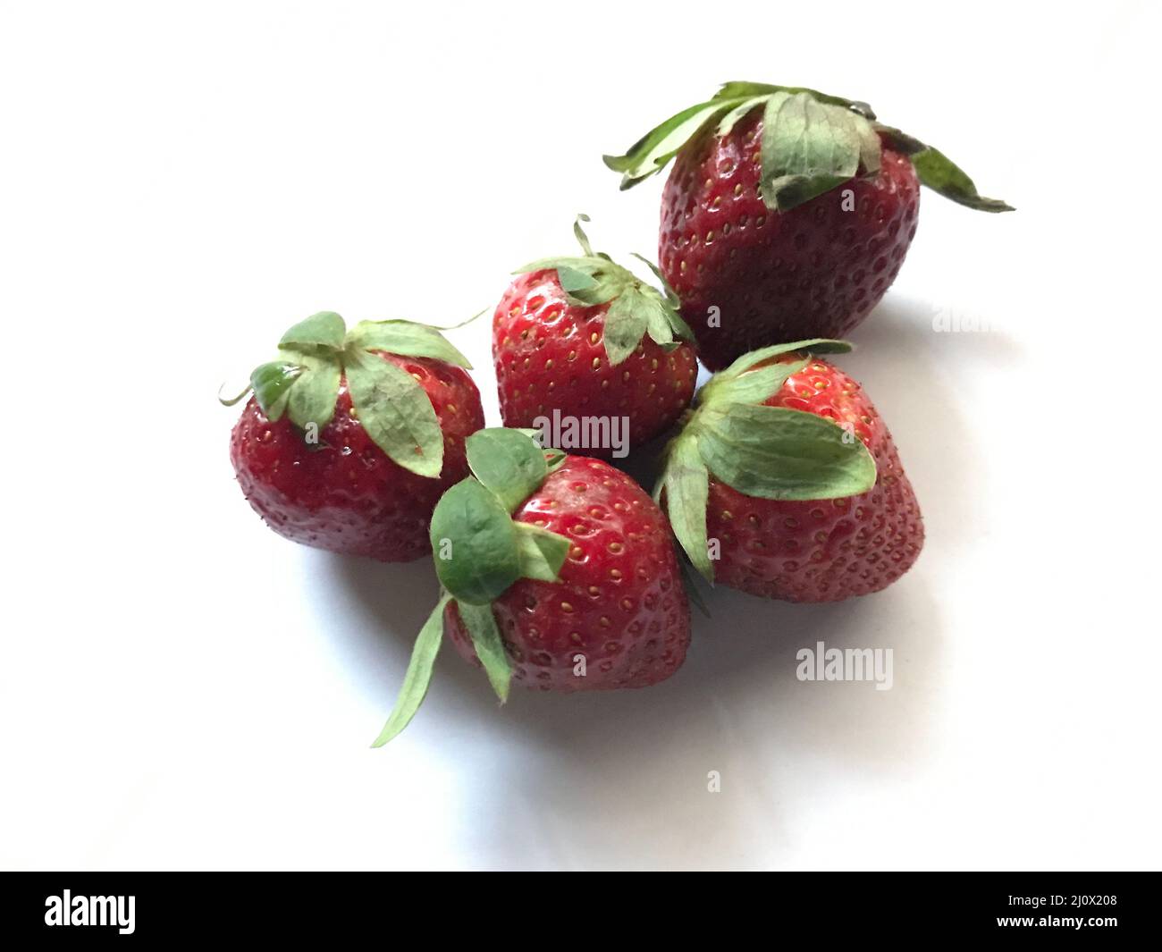 five strawberries isolated on white background . Strawberry isolated ...