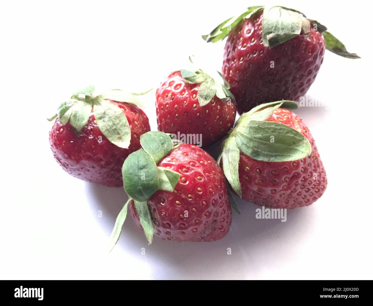 five strawberries isolated on white background . Strawberry isolated ...