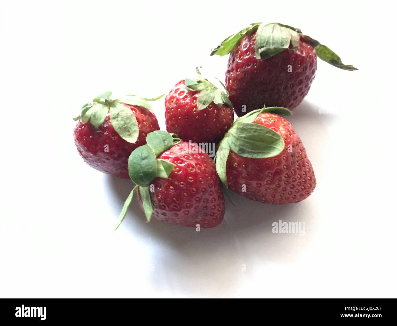 five strawberries isolated on white background . Strawberry isolated ...